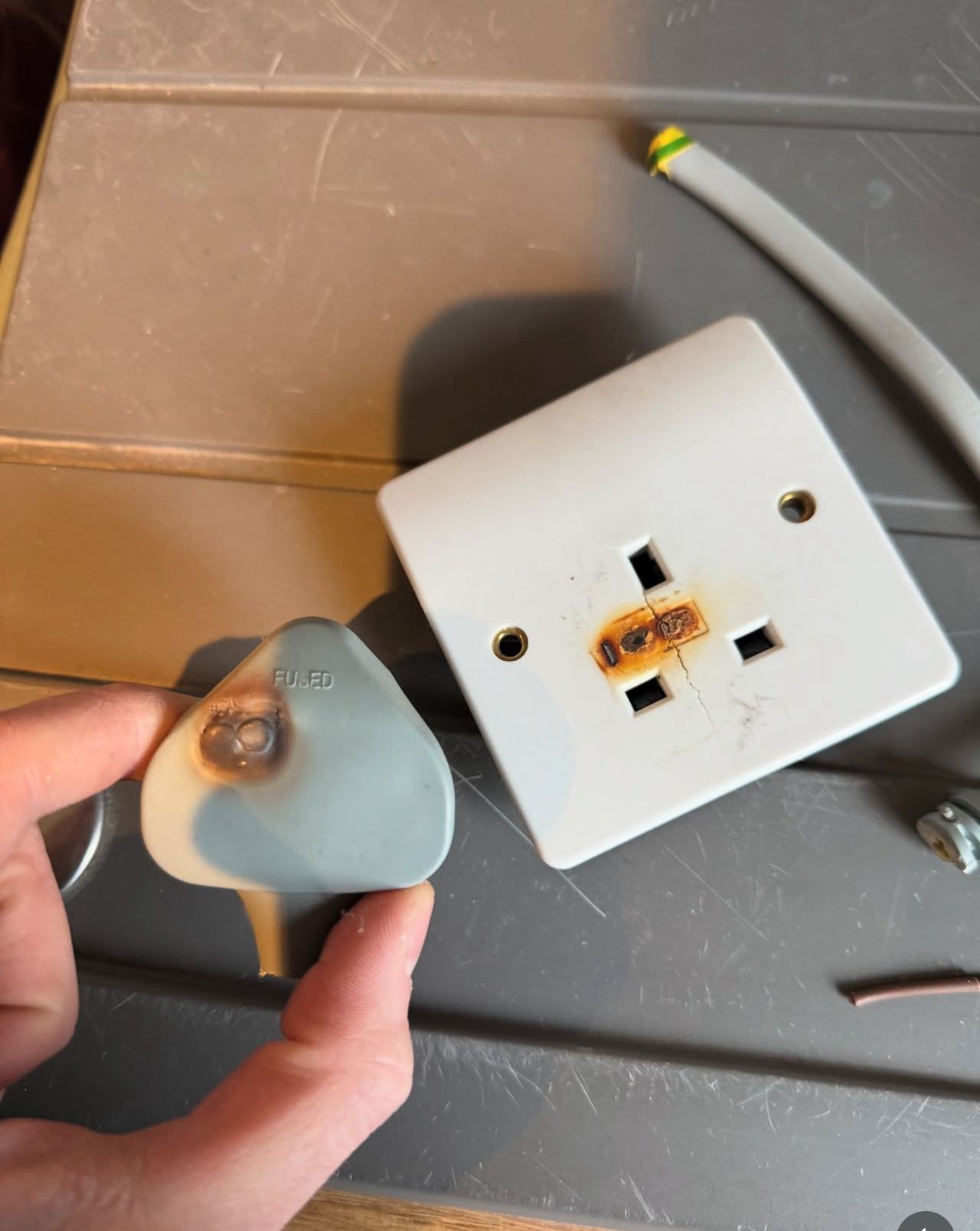 Burnt Socket Found During an EICR, Dollis Hill